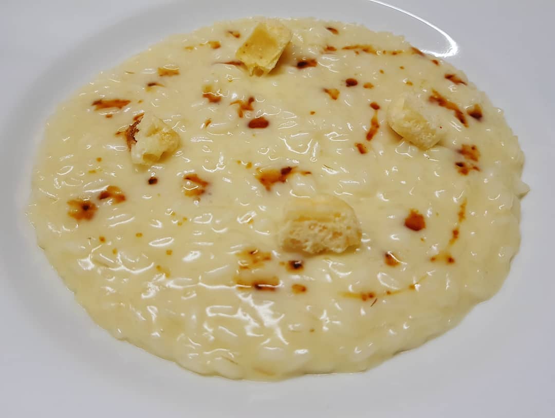 Risotto alla parmigiana, come si prepara? La ricetta classica e ...
