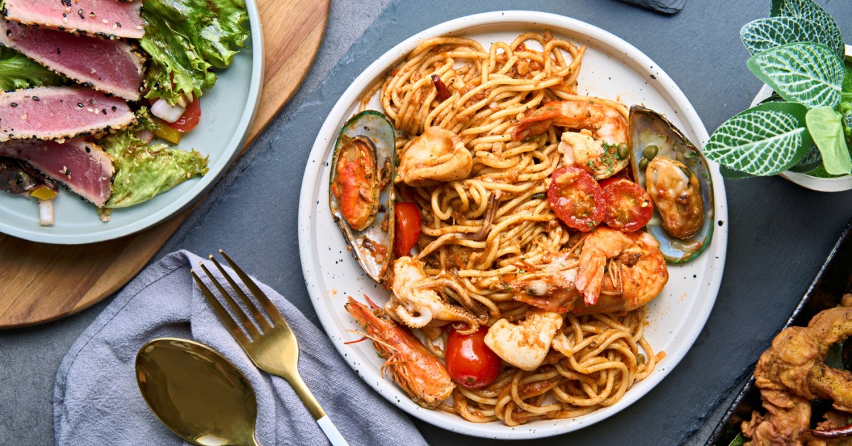 Spaghetti con sugo di pesce, mare e tradizione | Paesi del Gusto